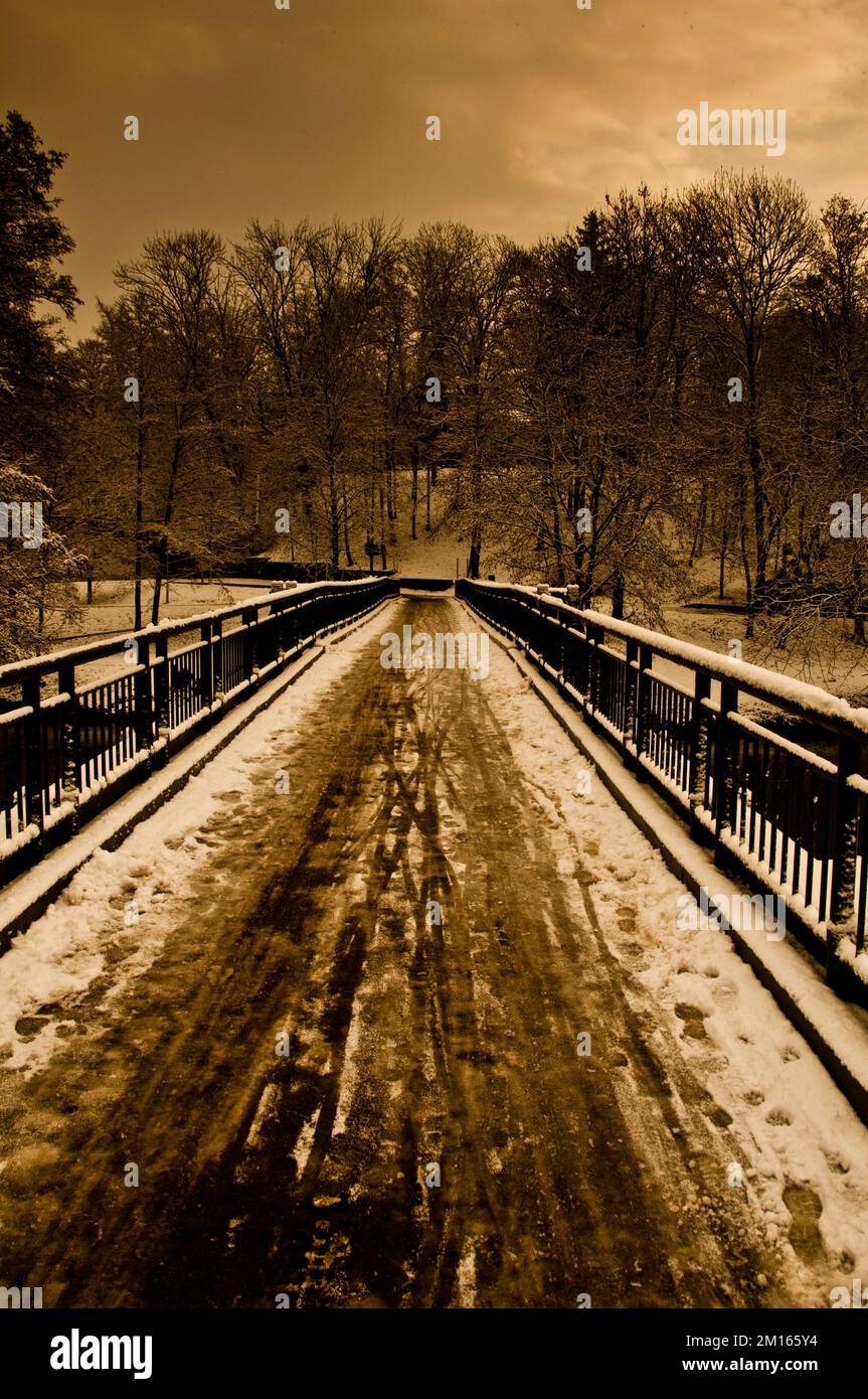 mysterious empty bridge with snow Stock Photo - Alamy