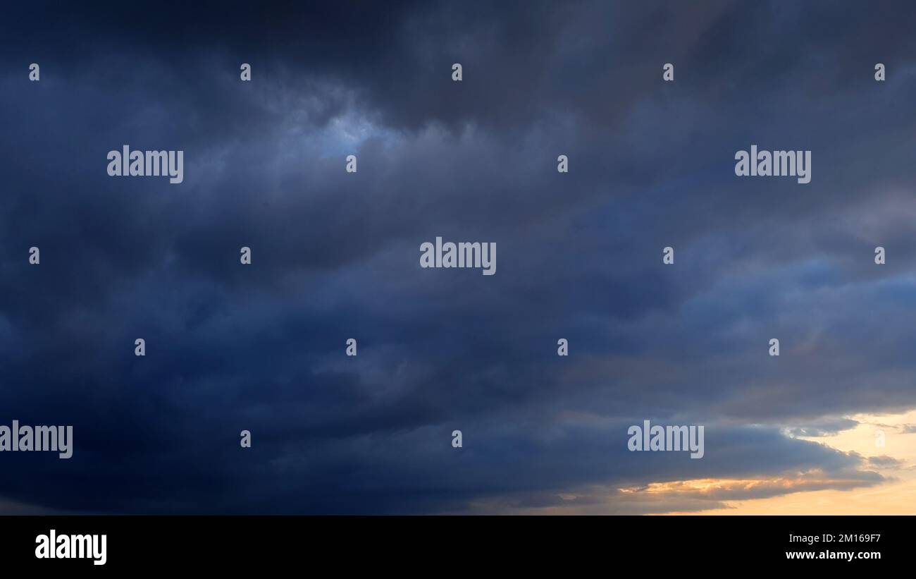 massive dark rain storm clouds backdrop for weather forecast - abstract ...