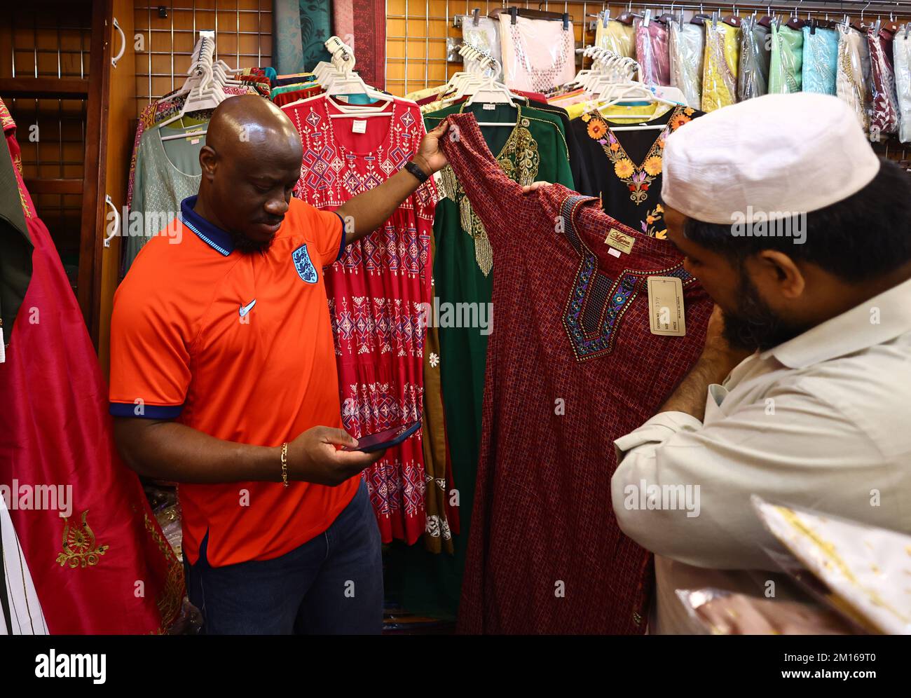Al Khor, Qatar, 10th December 2022. England fans shopping in the Souk ...