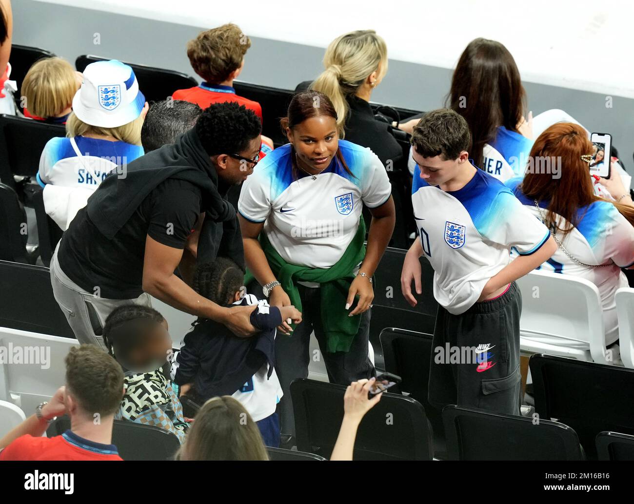 Paige Milian (centre), partner of Raheem Sterling in the stands ahead ...