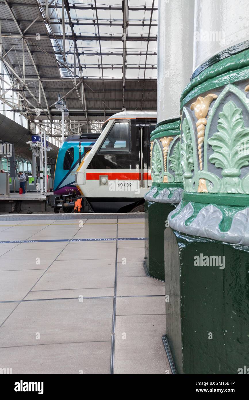 Manchester Piccadilly railway station, ornate pillars with intercity ...