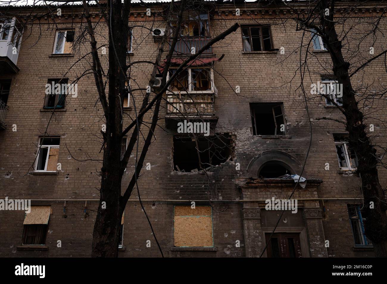 A wall destroyed by artillery seen in the city of Bakhmut. The city of ...