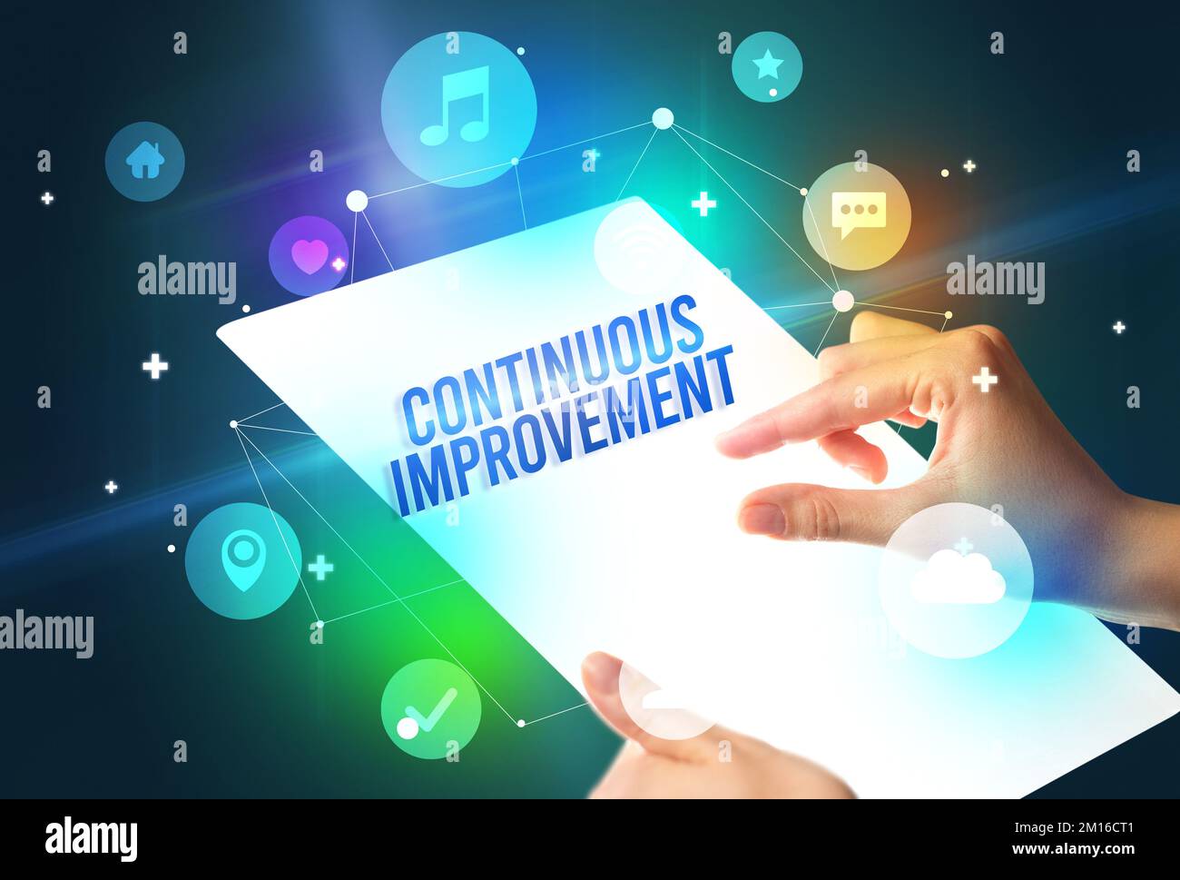 Holding futuristic tablet, new media concept Stock Photo - Alamy