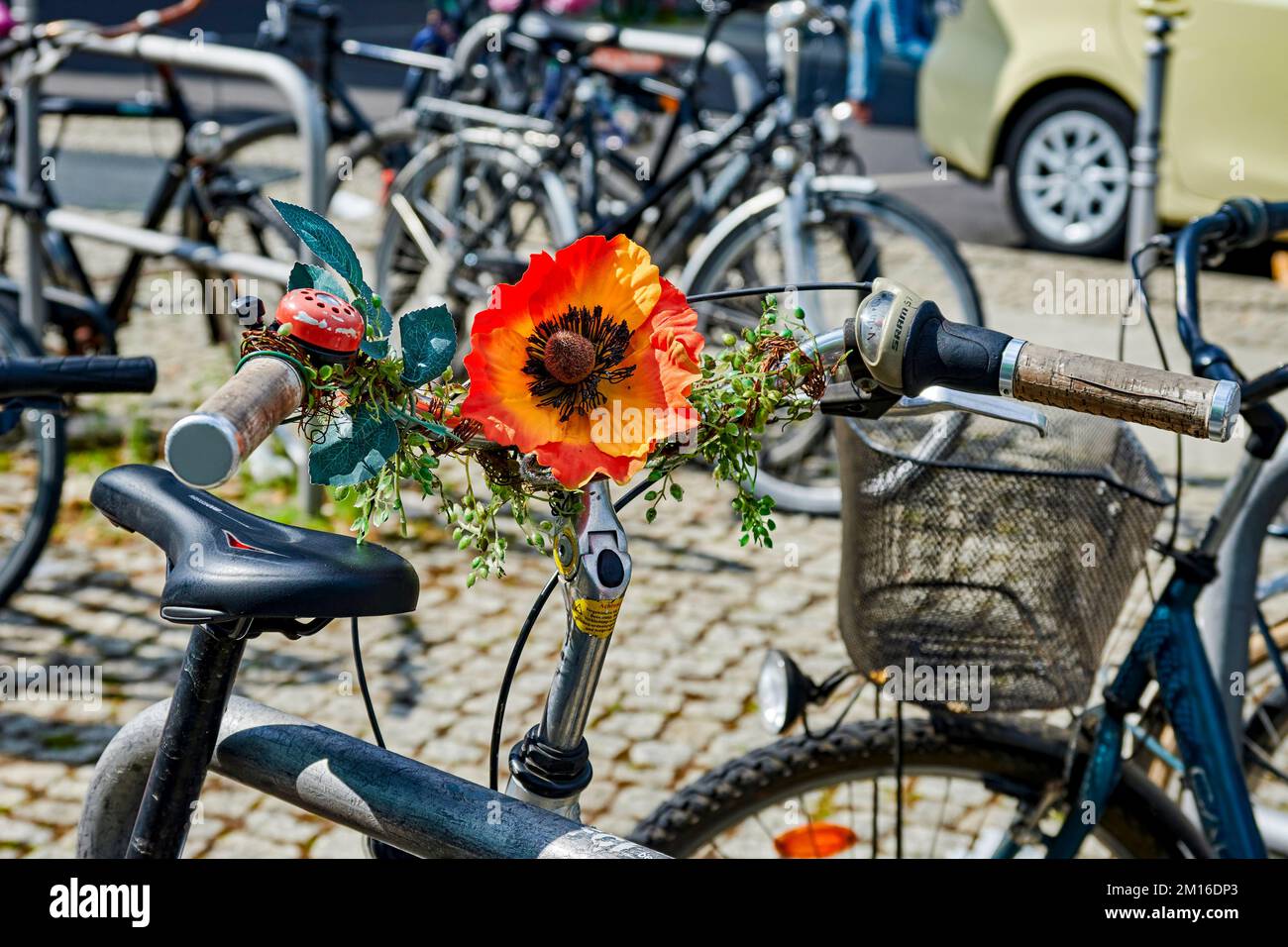 Berlin, Germany - July 29, 2021: Parked bicycle with floral decorations ...