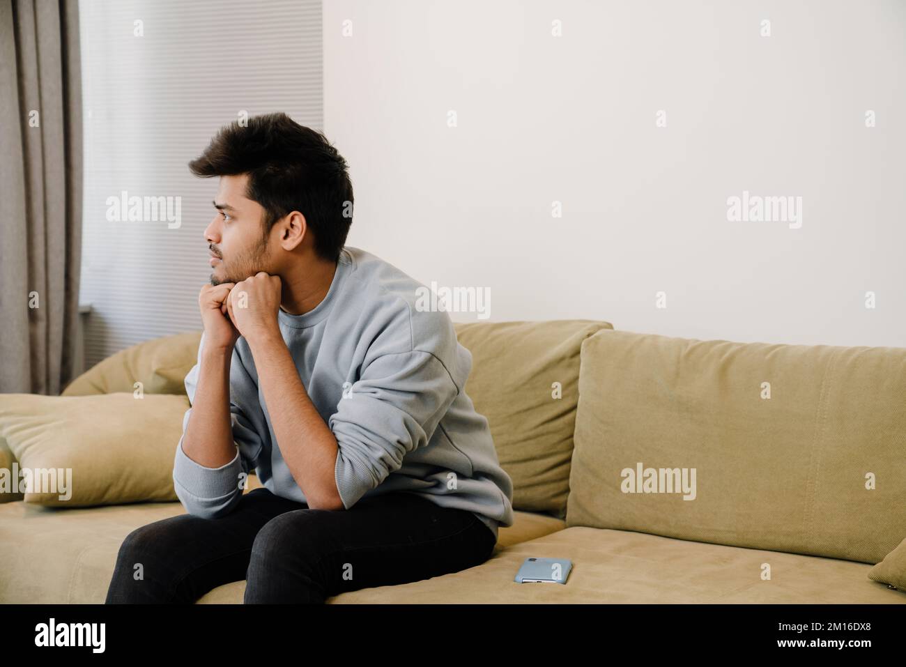 Indian thoughtful man guy thinking hi-res stock photography and images ...