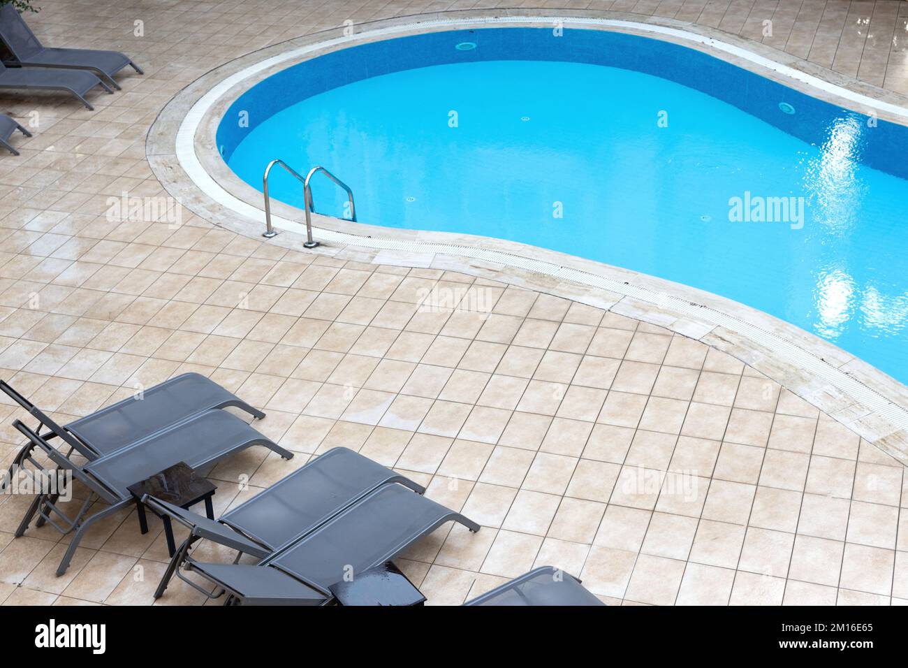 Swimming pool deck chair towel hi-res stock photography and images - Alamy