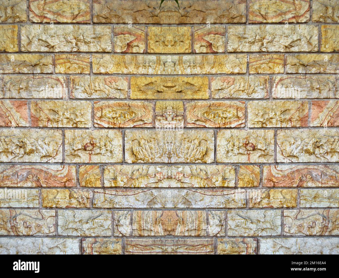 Sturdy yellow and beige cut stone wall, good for backgrounds, seamless ...
