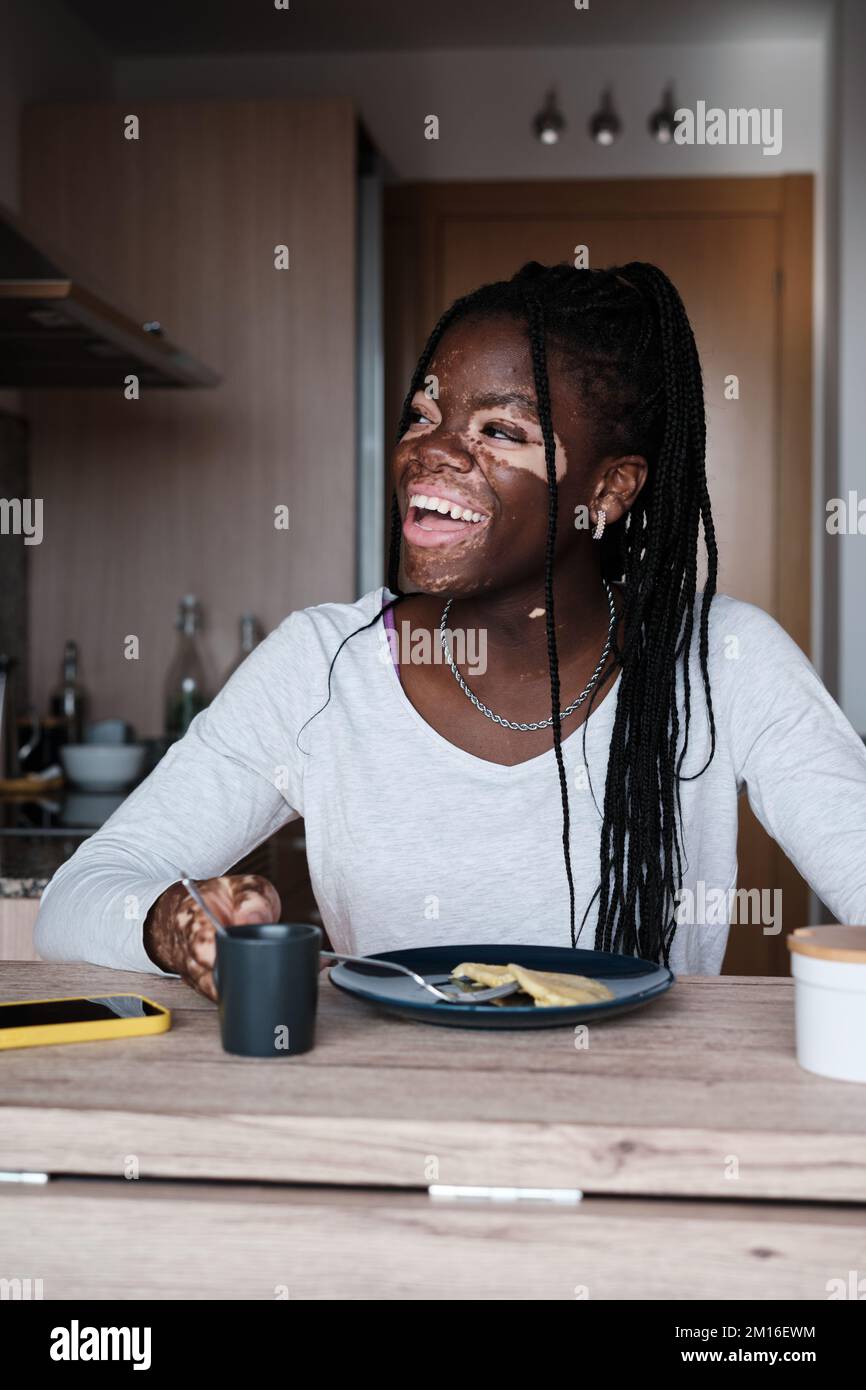 Woman having healthy breakfast kitchen hi-res stock photography and ...