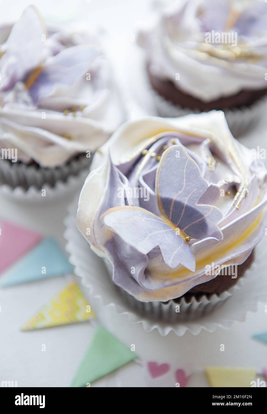 Birthday holiday sweet cupcakes with butterfly decorations Stock Photo ...