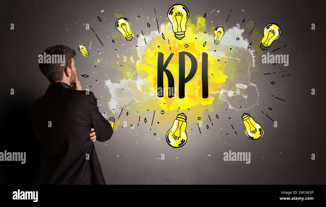 man drawing colorful light bulb Stock Photo - Alamy