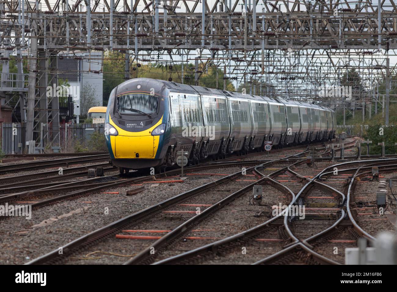 Avanti west Coast class 390 Pendolino train passing Crewe north ...