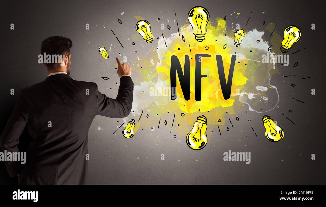 man drawing colorful light bulb Stock Photo - Alamy