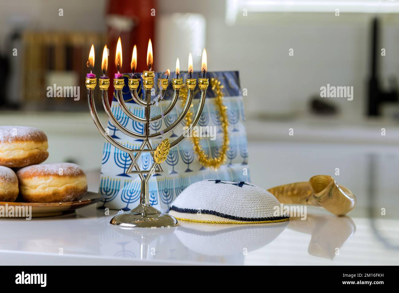 Symbol from Jewish religion of Chanukah burning candles to Hanukkiah ...