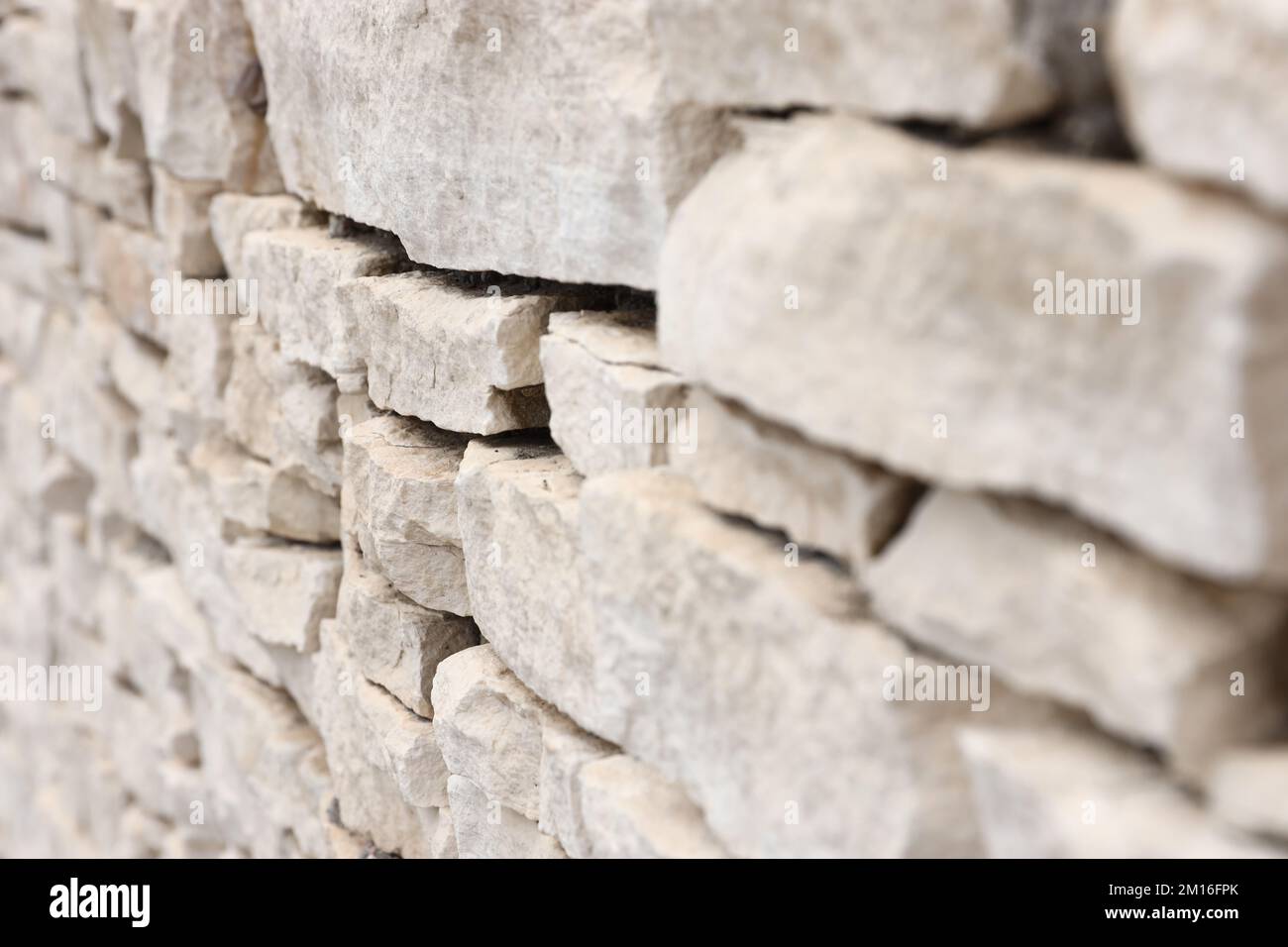 Texture of a stone wall background. Part of a stone fortress or castle ...