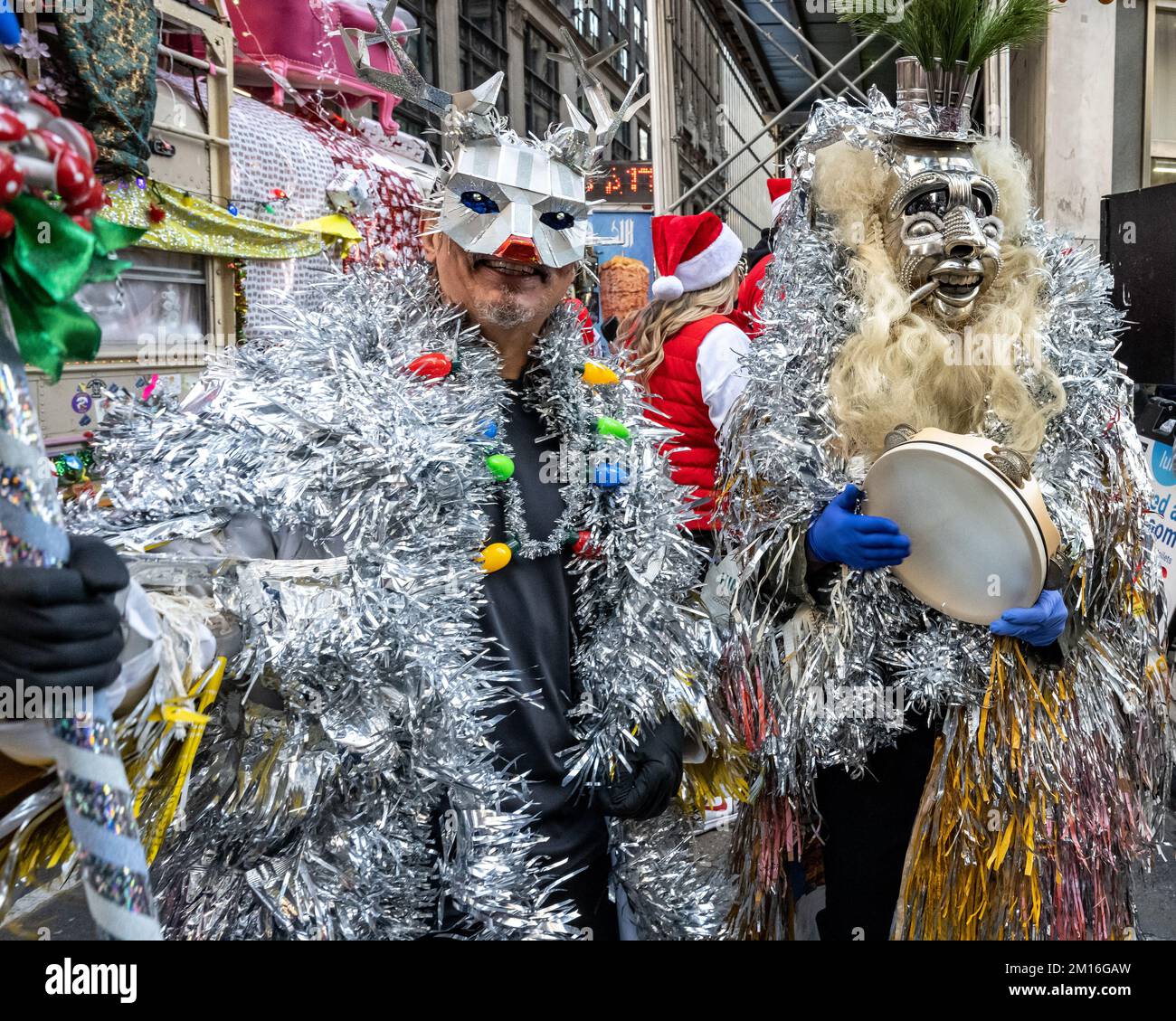New York, USA. 10th Dec, 2022. Revelers dressed as Santa Claus have fun ...