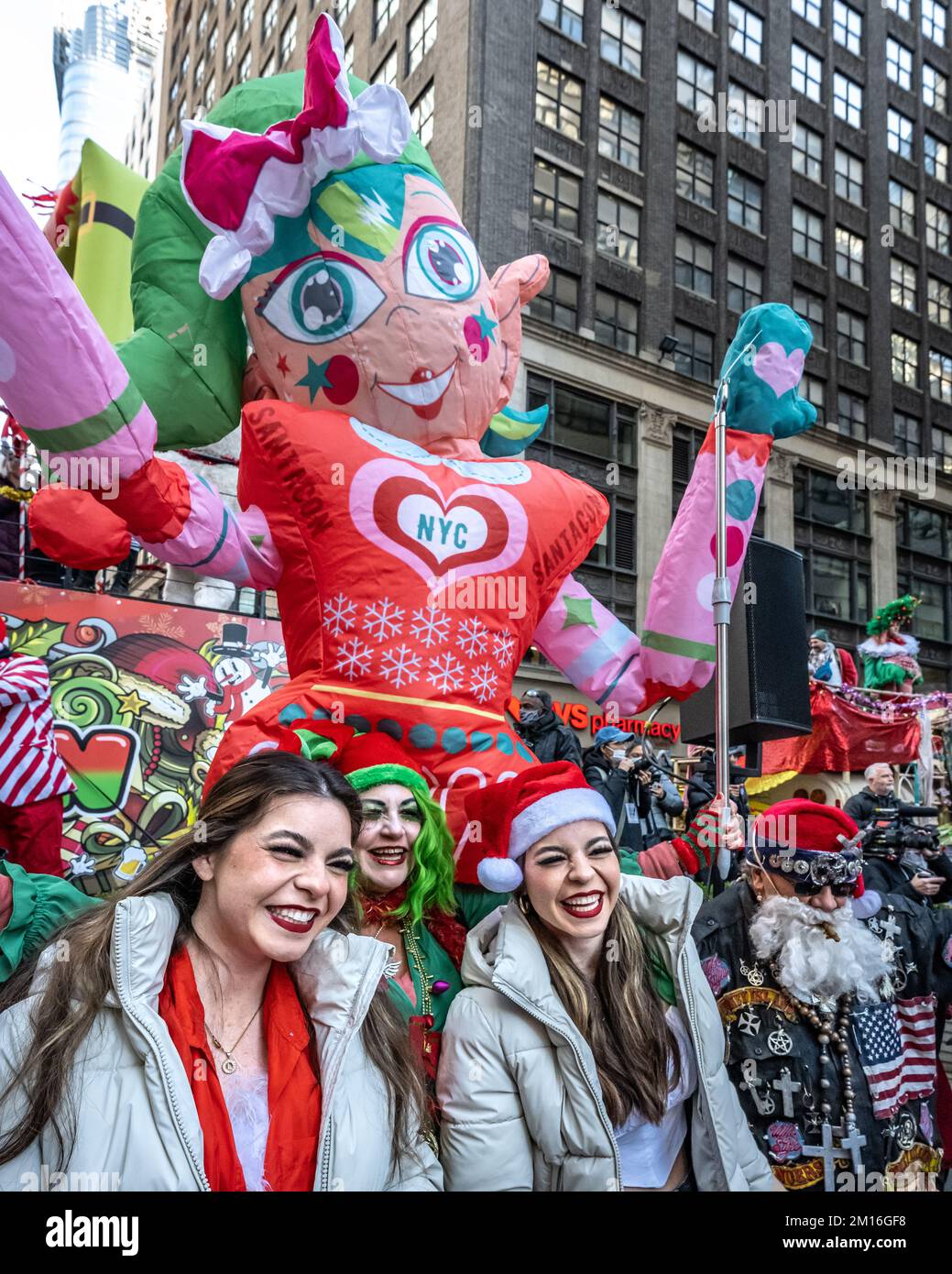 New York, USA. 10th Dec, 2022. Revelers dressed as Santa Claus have fun ...