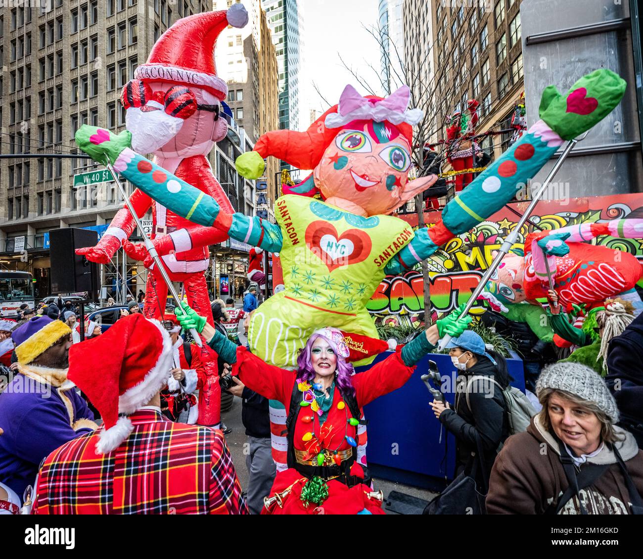 New York, USA. 10th Dec, 2022. Revelers dressed as Santa Claus have fun ...