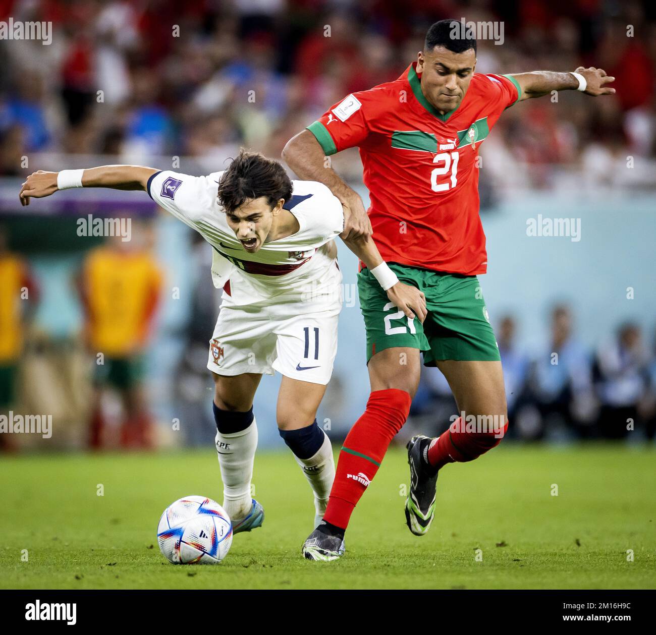 DOHA - Joao Felix of Portugal and Walid Cheddira of Morocco during the ...