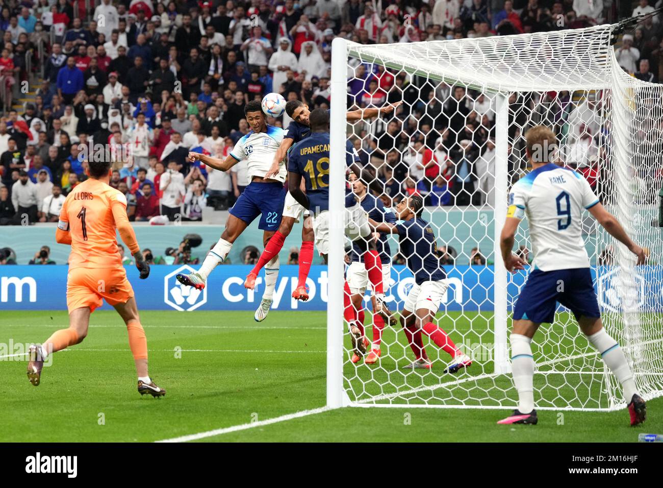 England's Jude Bellingham battles for possession of the ball in the air ...
