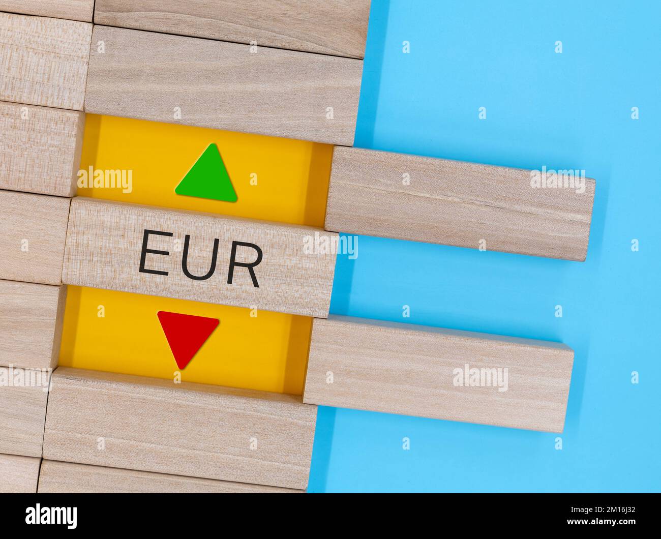 EUR symbol icon up down written on block Stock Photo - Alamy