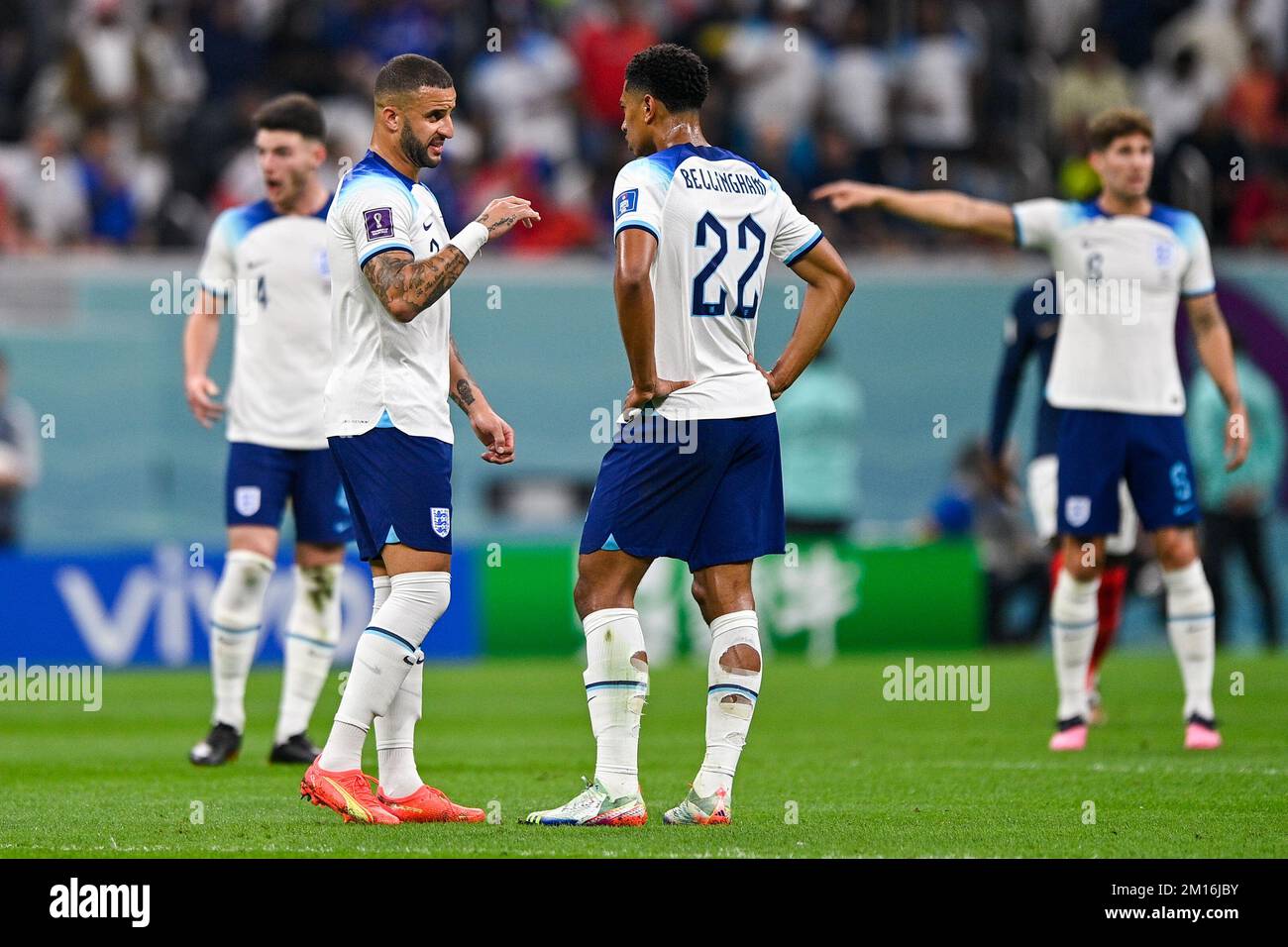 AL KHOR, QATAR - DECEMBER 10: Kyle Walker of England discusses with ...