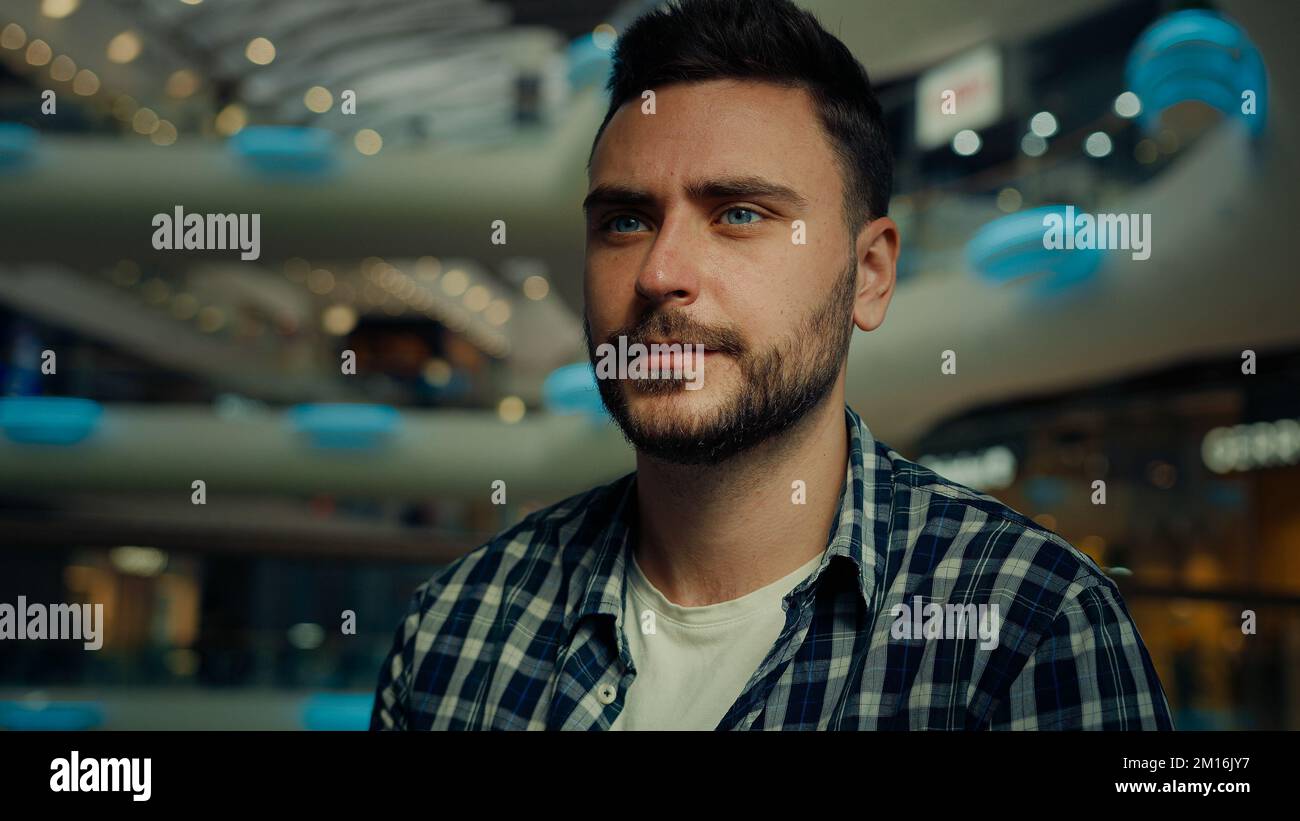 Healthy arabian man shopper businessman take off protective respirator ...