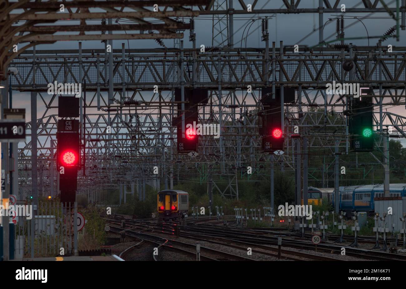 Transport For Wales class 153 sprinter train passing the signal gantry ...