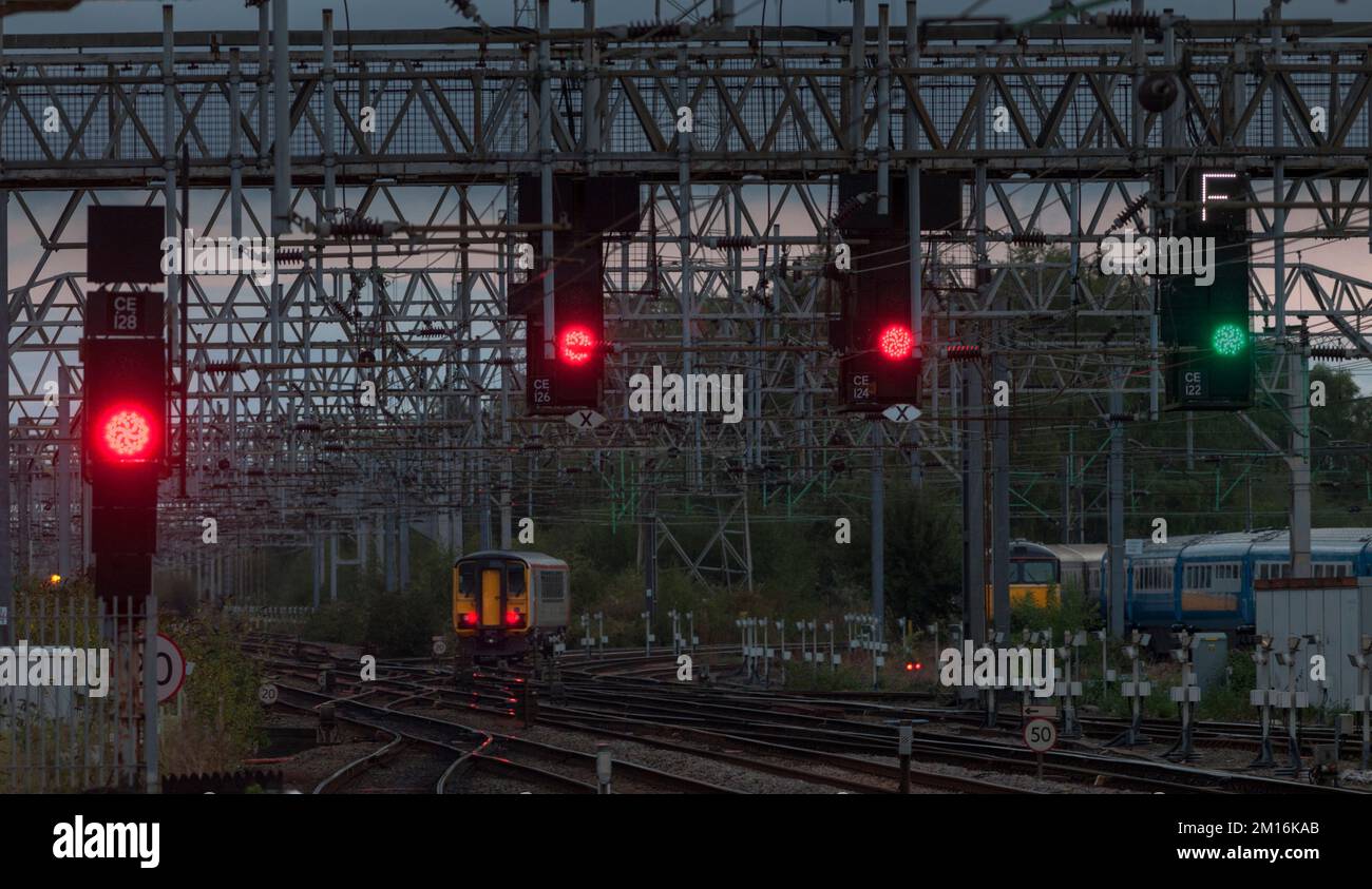 Transport For Wales class 153 sprinter train passing the signal gantry ...