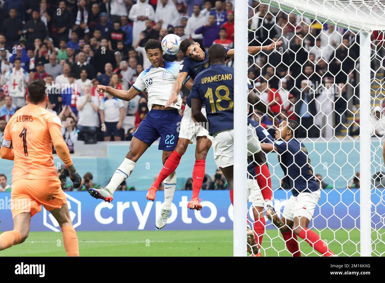 Al Khor, Qatar. 10th Dec, 2022. England's Jude Bellingham (2nd L) vies ...