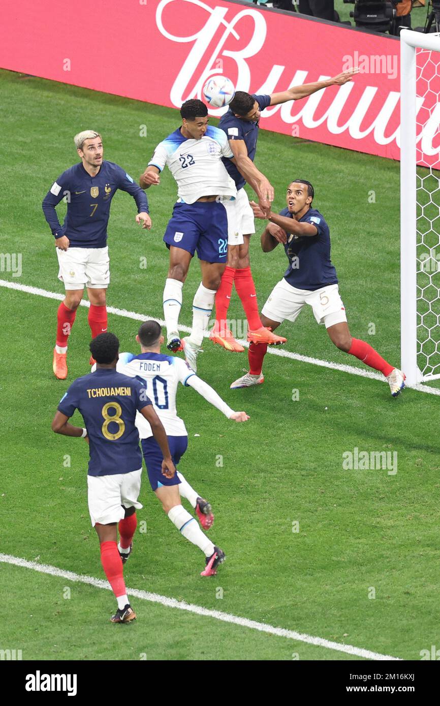 Al Khor, Qatar. 10th Dec, 2022. England's Jude Bellingham (3rd R) vies ...