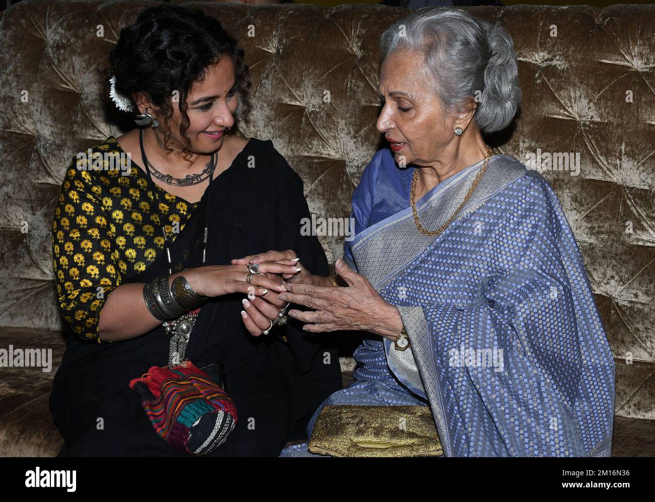 L-R Bollywood actress Divya Dutta shows her jewellery to actress ...