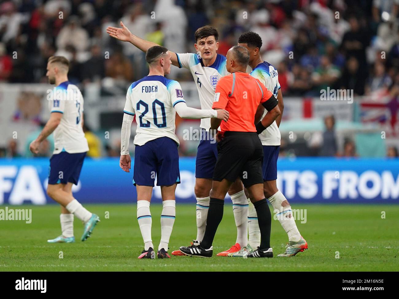 England's Harry Maguire, Phil Foden and Jude Bellingham argue with ...