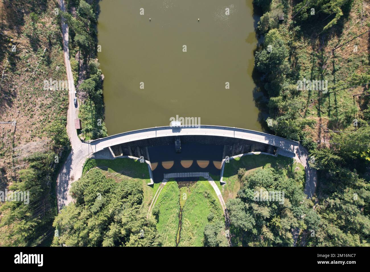 An aerial view of the stone dam with an arch bridge of the Sedlice ...