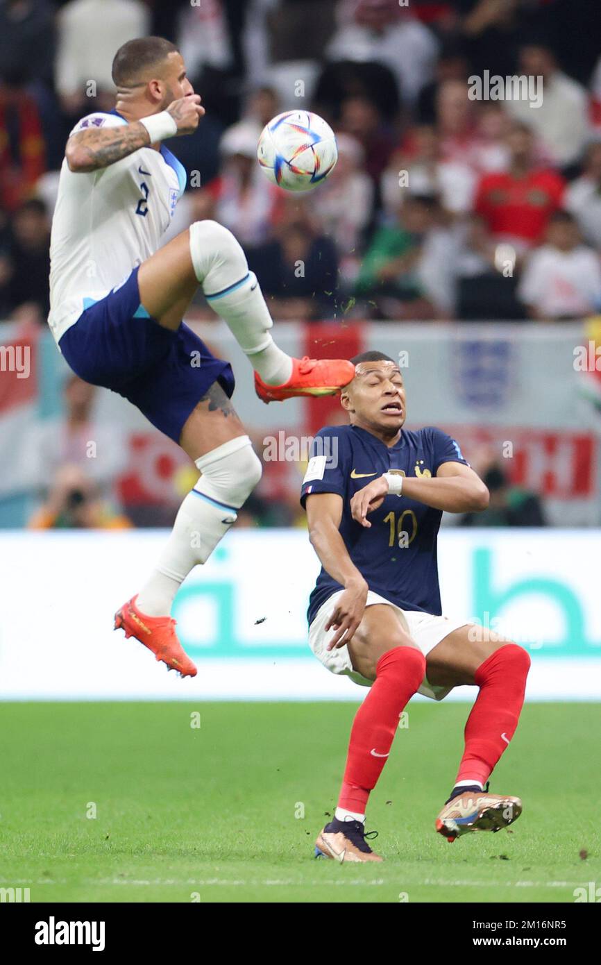Al Khor, Qatar. 10th Dec, 2022. Kyle Walker (L) of England vies with ...