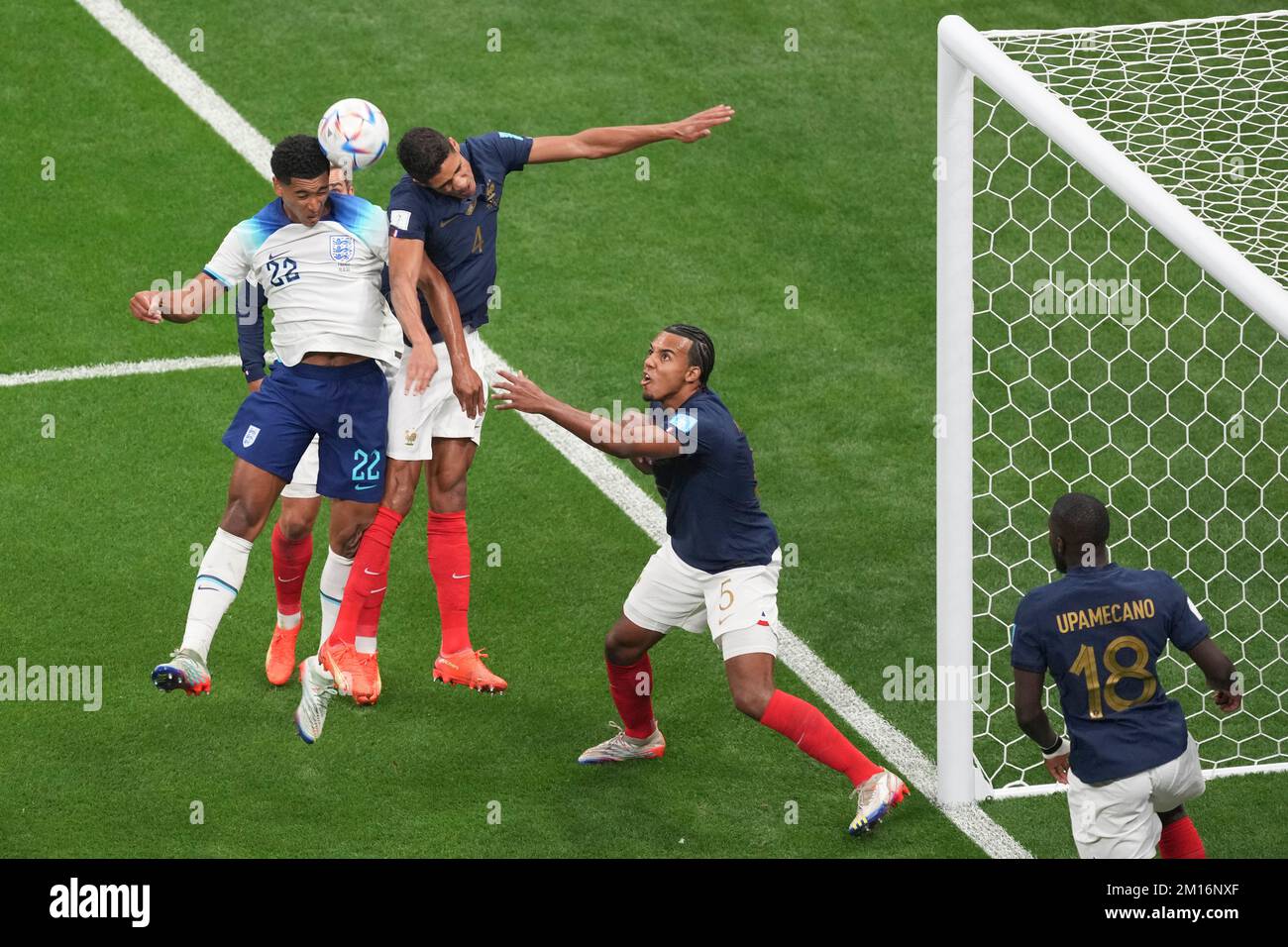 Al Khor, Qatar. 10th Dec, 2022. England's Jude Bellingham (1st L) vies ...