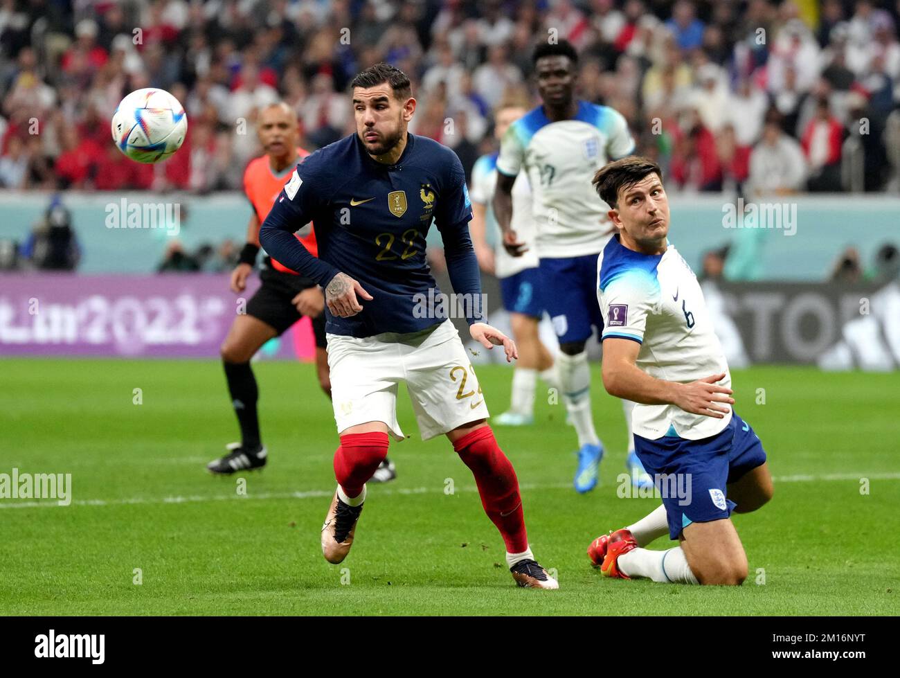 England's Harry Maguire, (right) under pressure from France's Theo ...