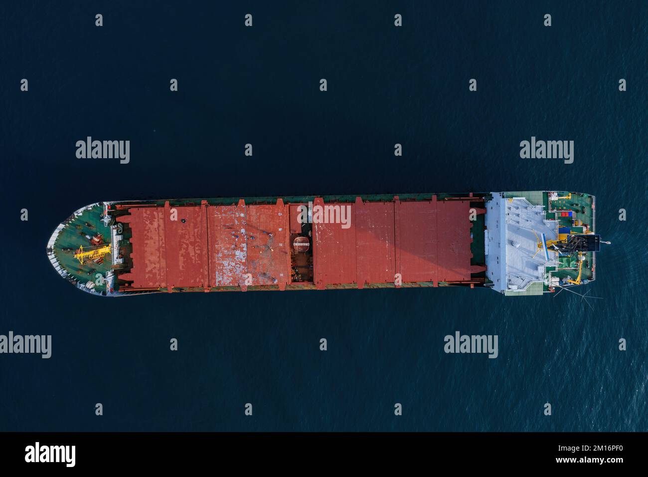 Cargo ship with containers, directly above drone view Stock Photo - Alamy