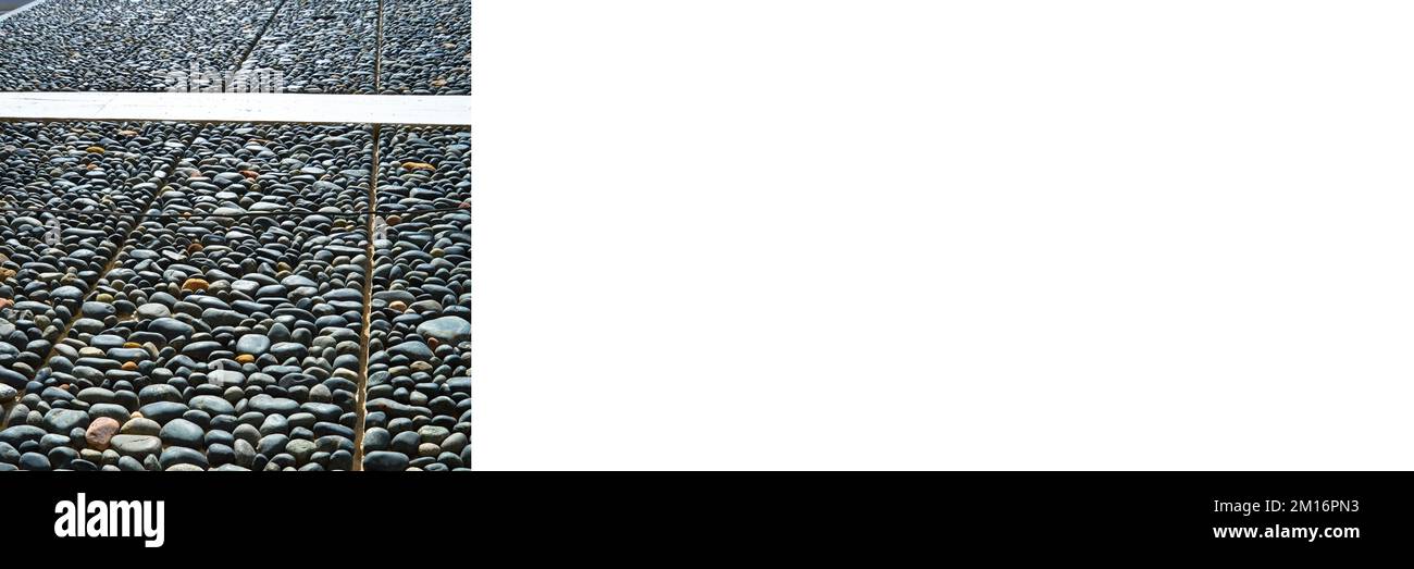 Wall texture decorated with blue pebbles, pebbles glued to the wall, background pebble wall ...