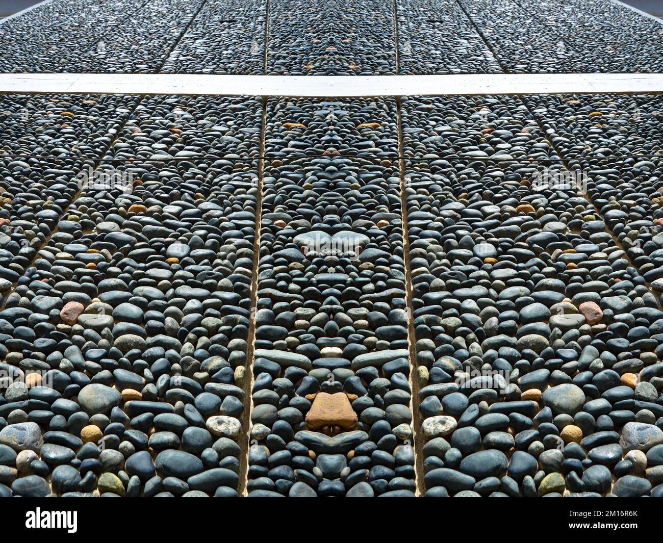 Wall texture decorated with blue pebbles, pebbles glued to the wall ...
