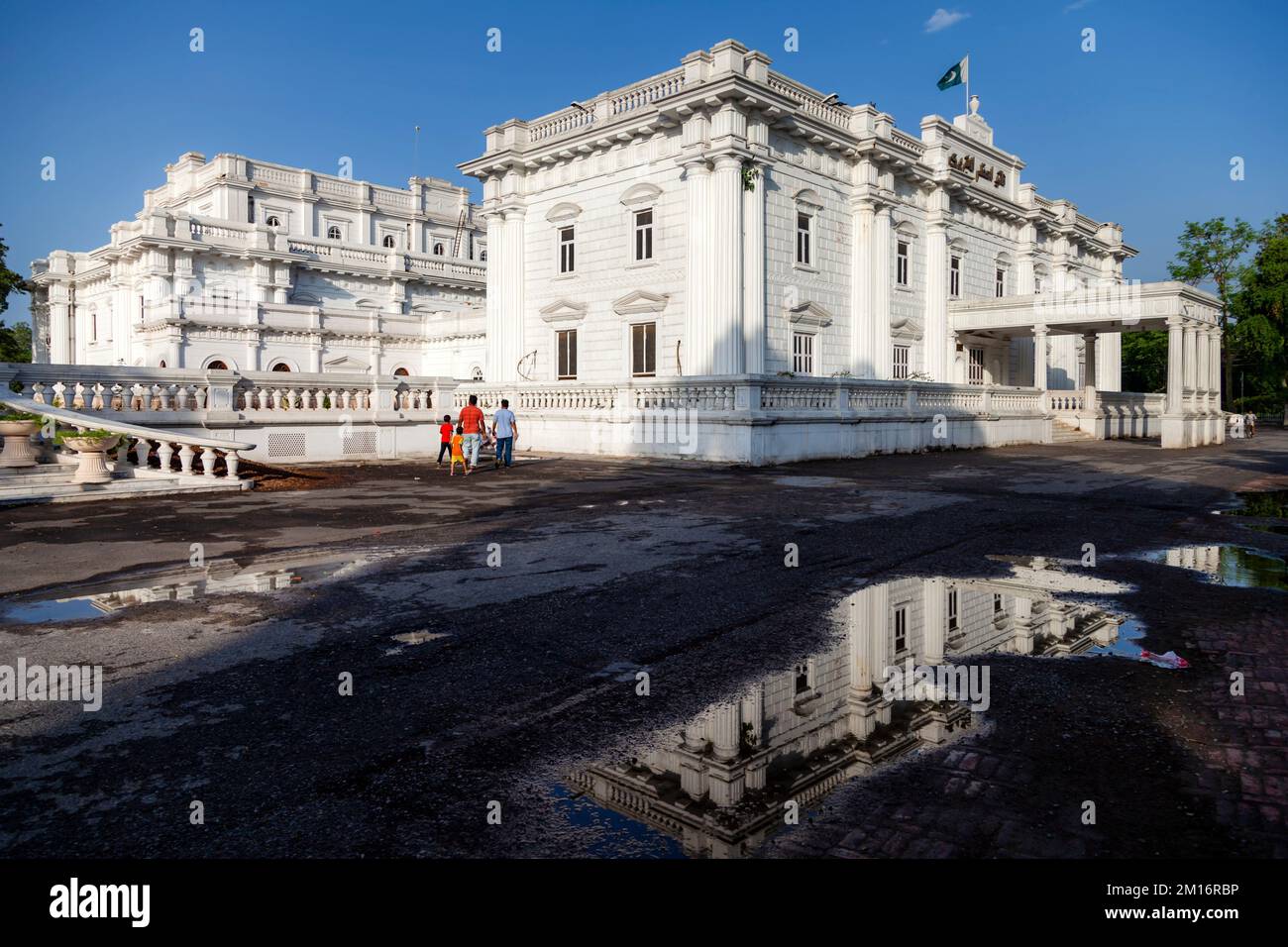 The Quaid-e-Azam Library with a partial reflection of rainwater in ...
