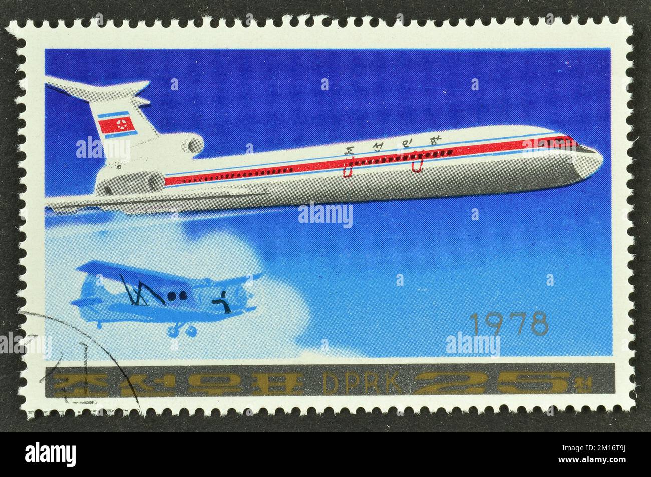 Cancelled postage stamp printed by North Korea, that shows Airplane Tu ...