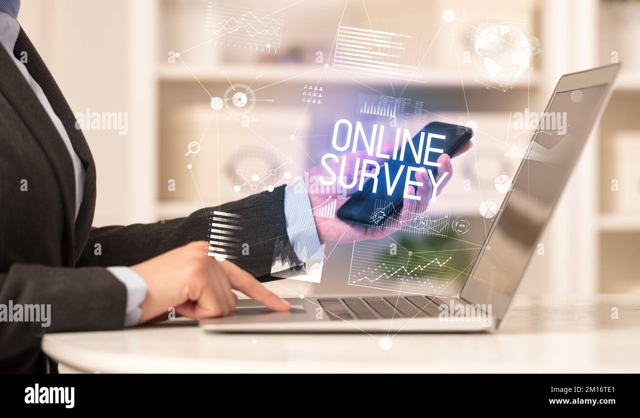 Side view of a business person working on laptop Stock Photo - Alamy