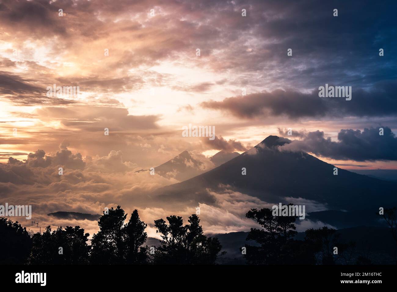 Sunset over volcanoes Fuego, Acatenango and Agua Stock Photo - Alamy