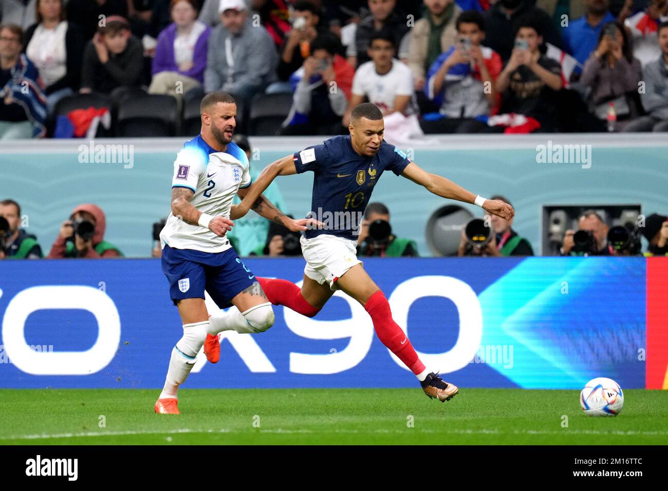 France's Kylian Mbappe, (right) battles for possession of the ball with ...