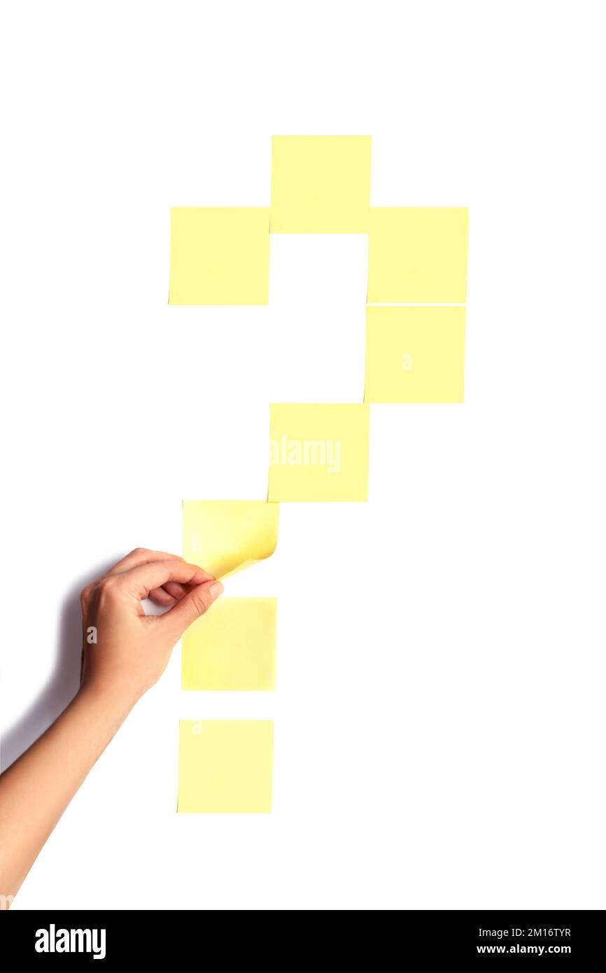 A question mark made with yellow empty sticky notes Stock Photo - Alamy