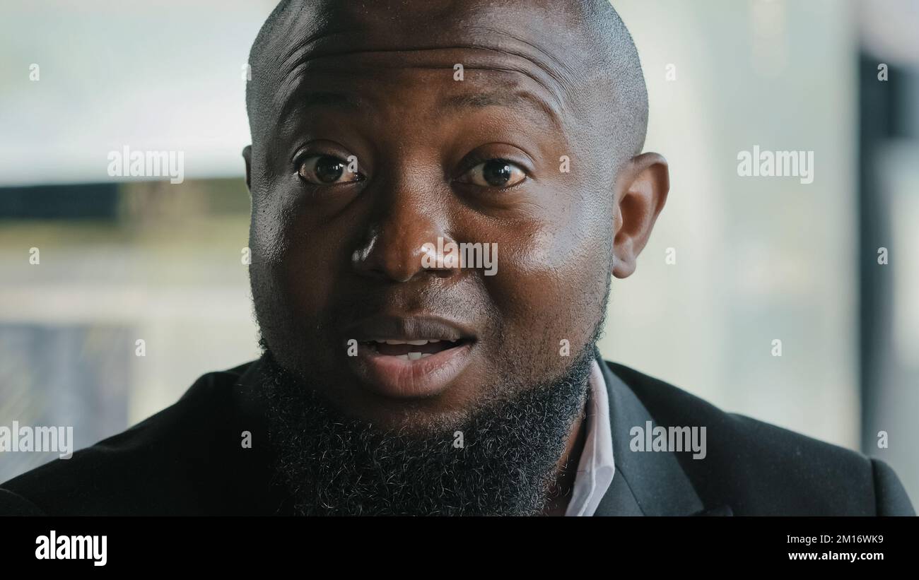 Positive cheerful adult male worker businessman african american ...