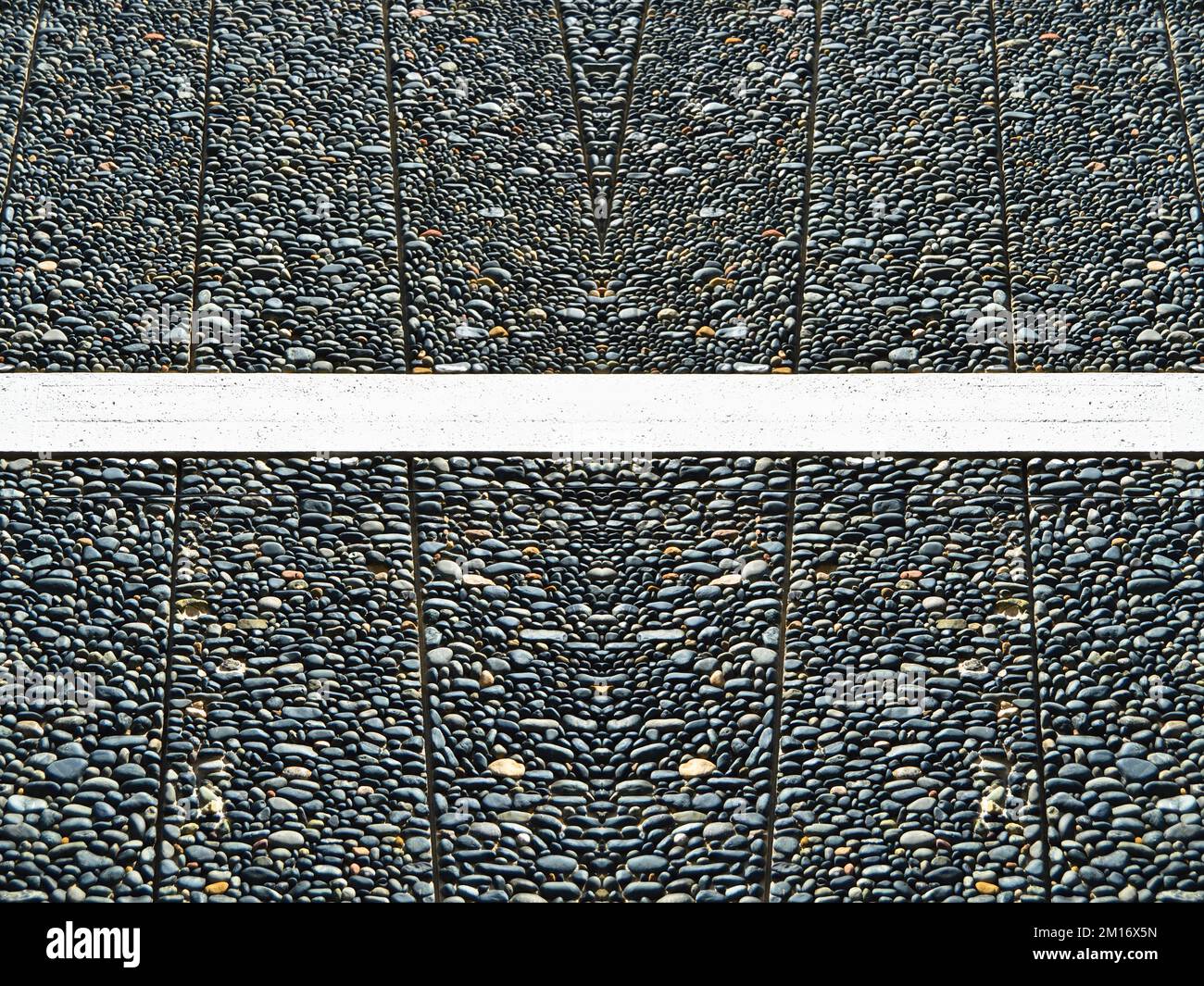 Wall texture decorated with blue pebbles, pebbles glued to the wall ...