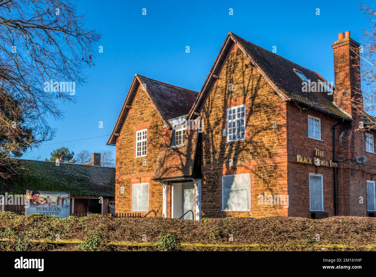 Closed and shuttered Black Horse Inn public house in Castle Rising ...