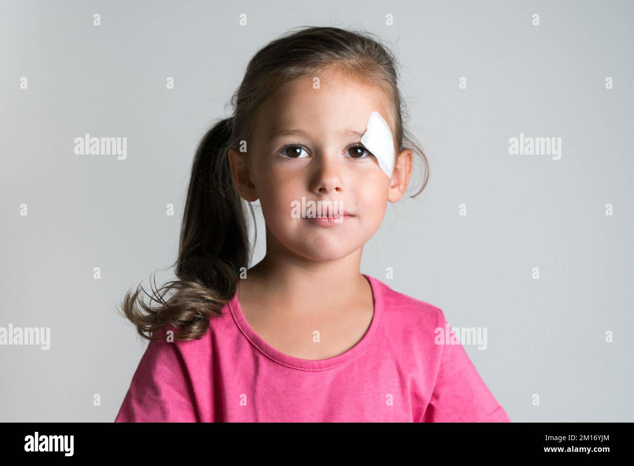 Close up nice, cute, lovely, adorable dark haired little child, girl ...