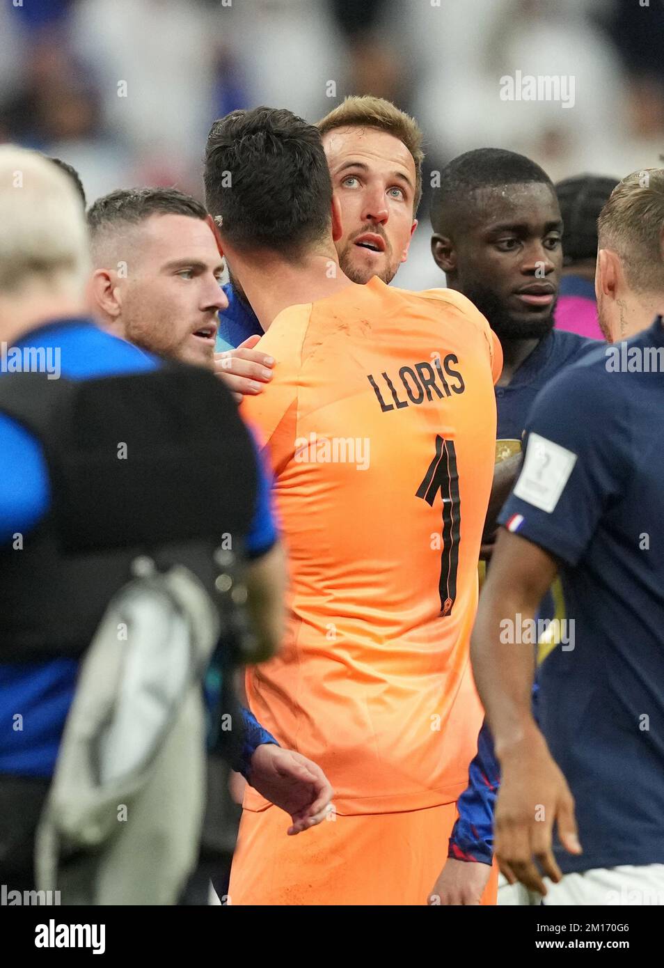 England's Harry Kane is consoled by club team-mate, France goalkeeper ...